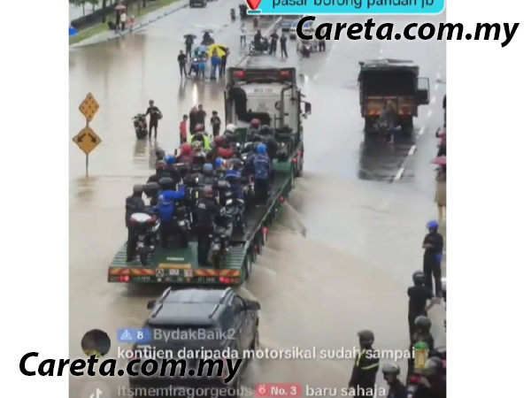 Pemandu treler dipuji, bantu penunggang motosikal rendah banjir | Careta